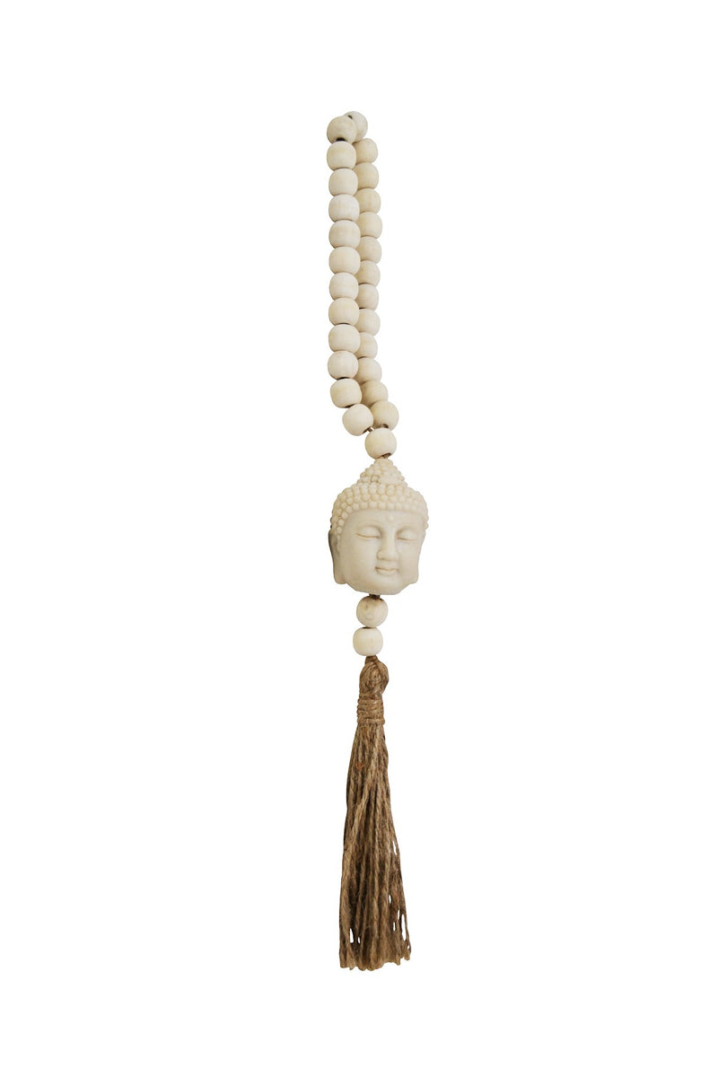 Buddha sur billes de bois – La mèche verte